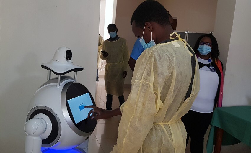 Rwandan medical workers deploy robots to minimise coronavirus risk ...